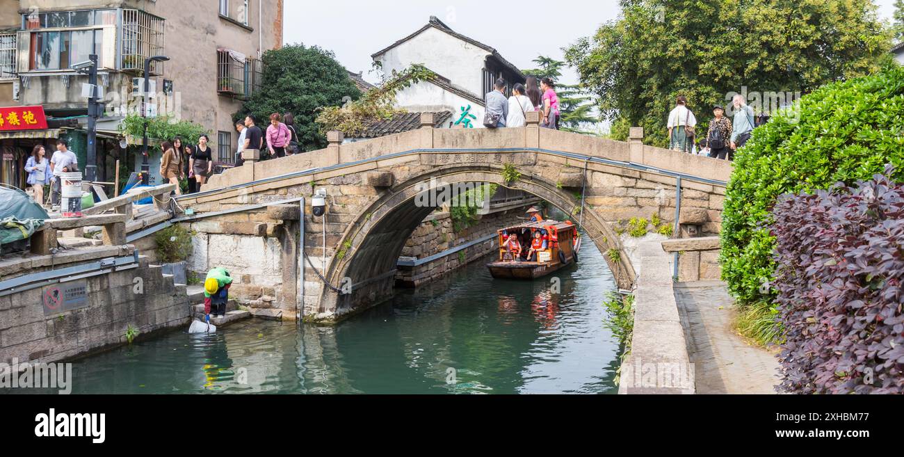 Panorama of a historic bridge crossing the canal in Suzhou, China Stock ...