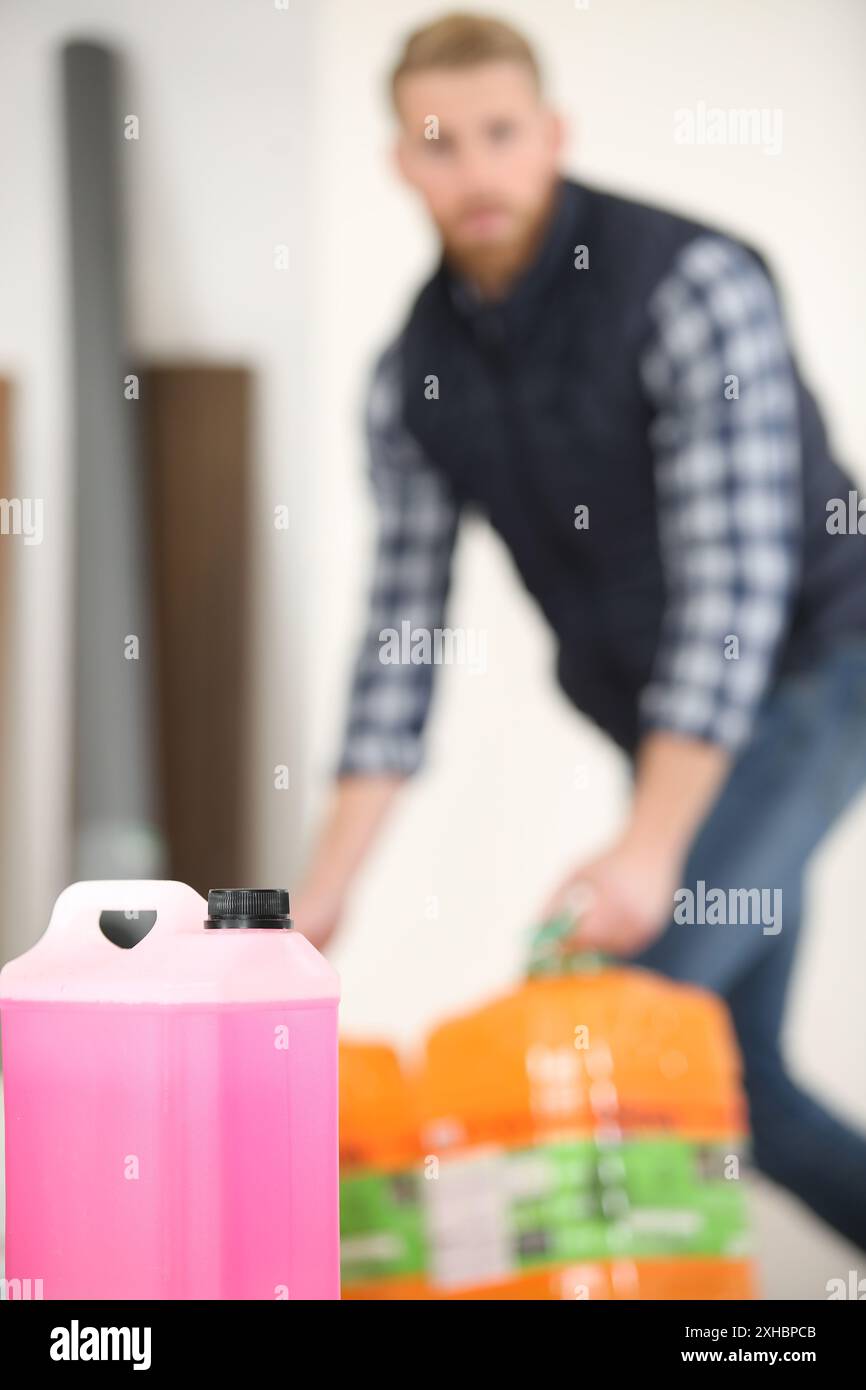 chemicals in containers in an industrial workplace Stock Photo - Alamy