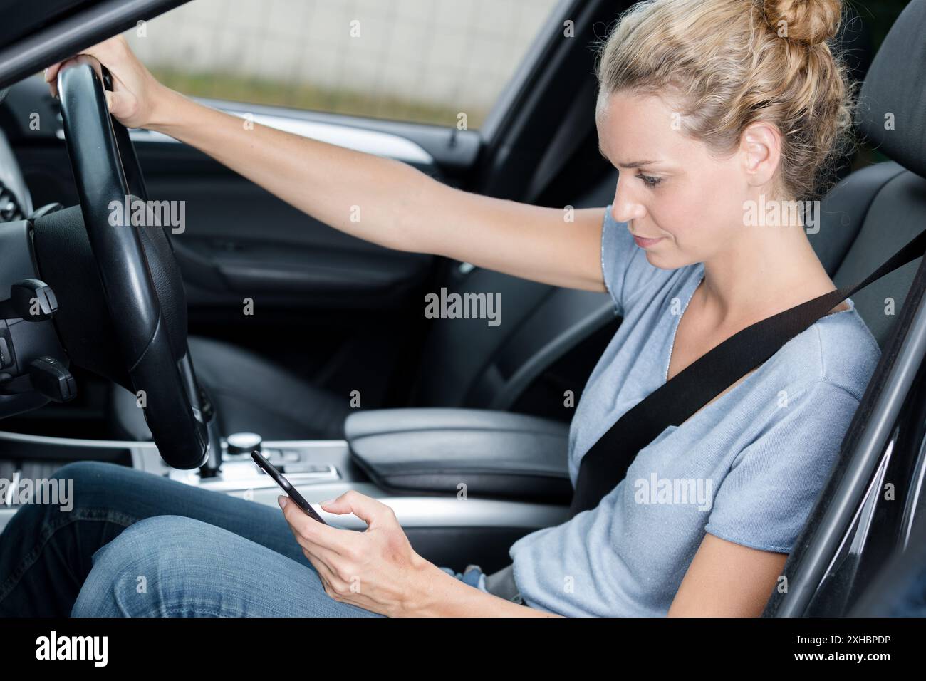 Teenage woman driving car hi-res stock photography and images - Alamy