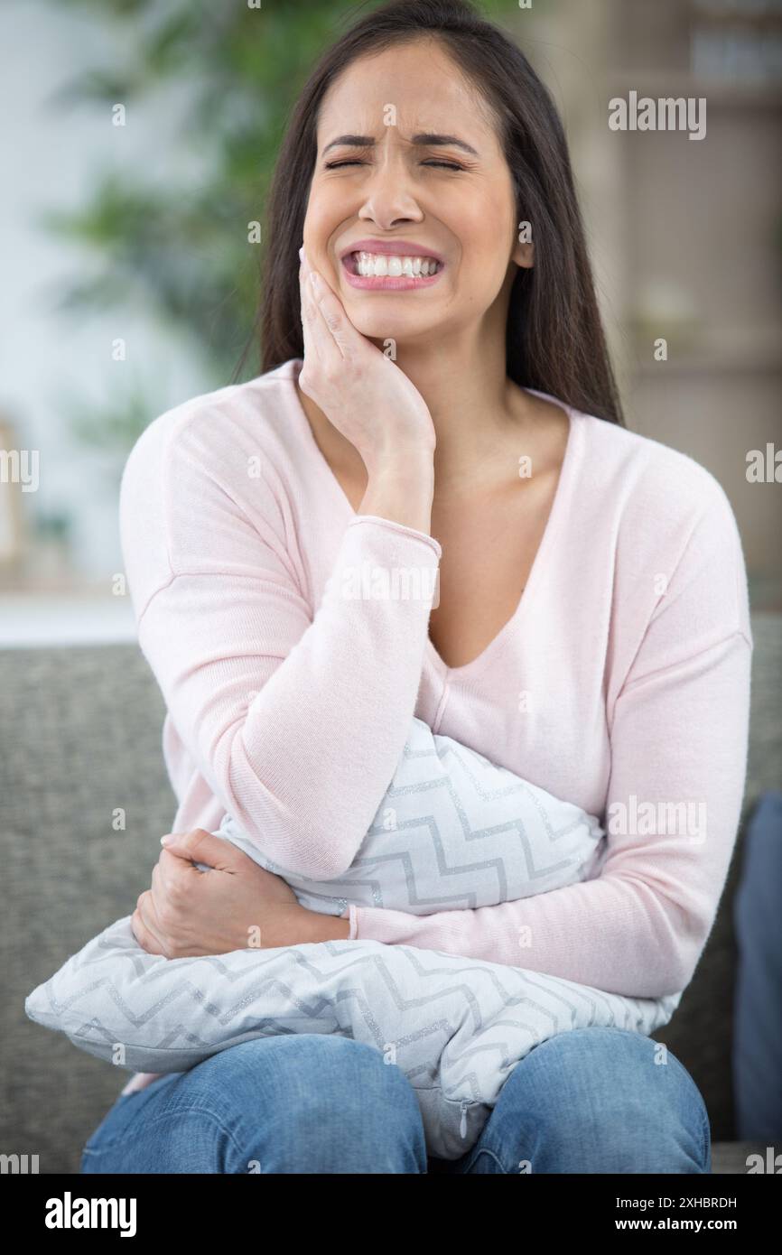 Portrait young indian woman toothache hi-res stock photography and ...