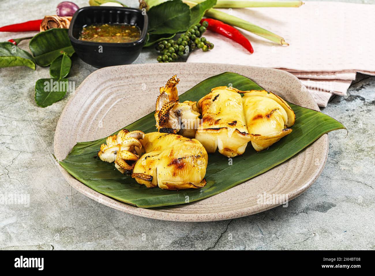 Delicous Grilled cuttlefish with sauce asian style Stock Photo - Alamy
