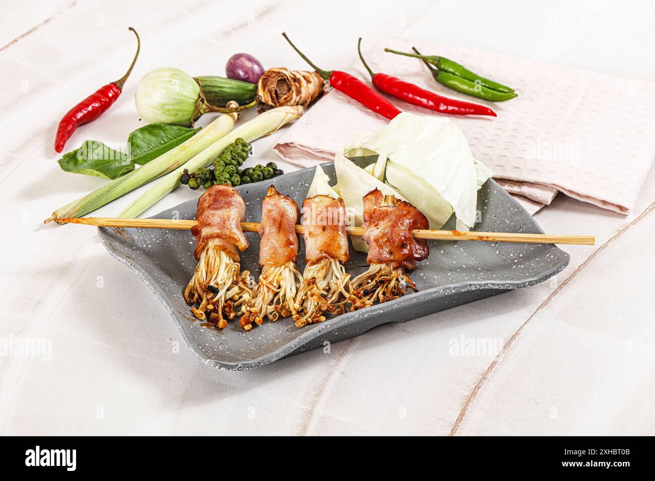Thai Street foof satay with bacon and mushroom enoki skewer Stock Photo ...