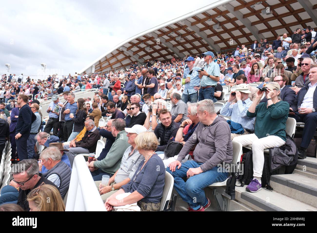 Cricket fans at Lord's cricket ground London UK watching a Test match ...