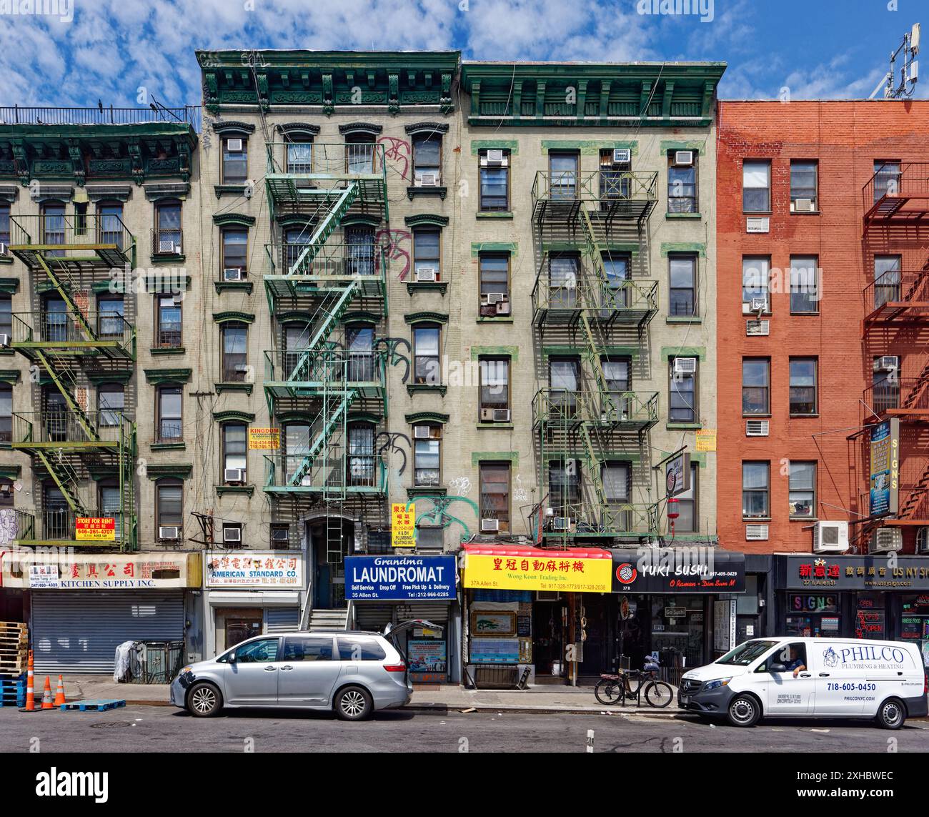 NYC Chinatown: A pair of run-down tenements on Allen Street; brick ...
