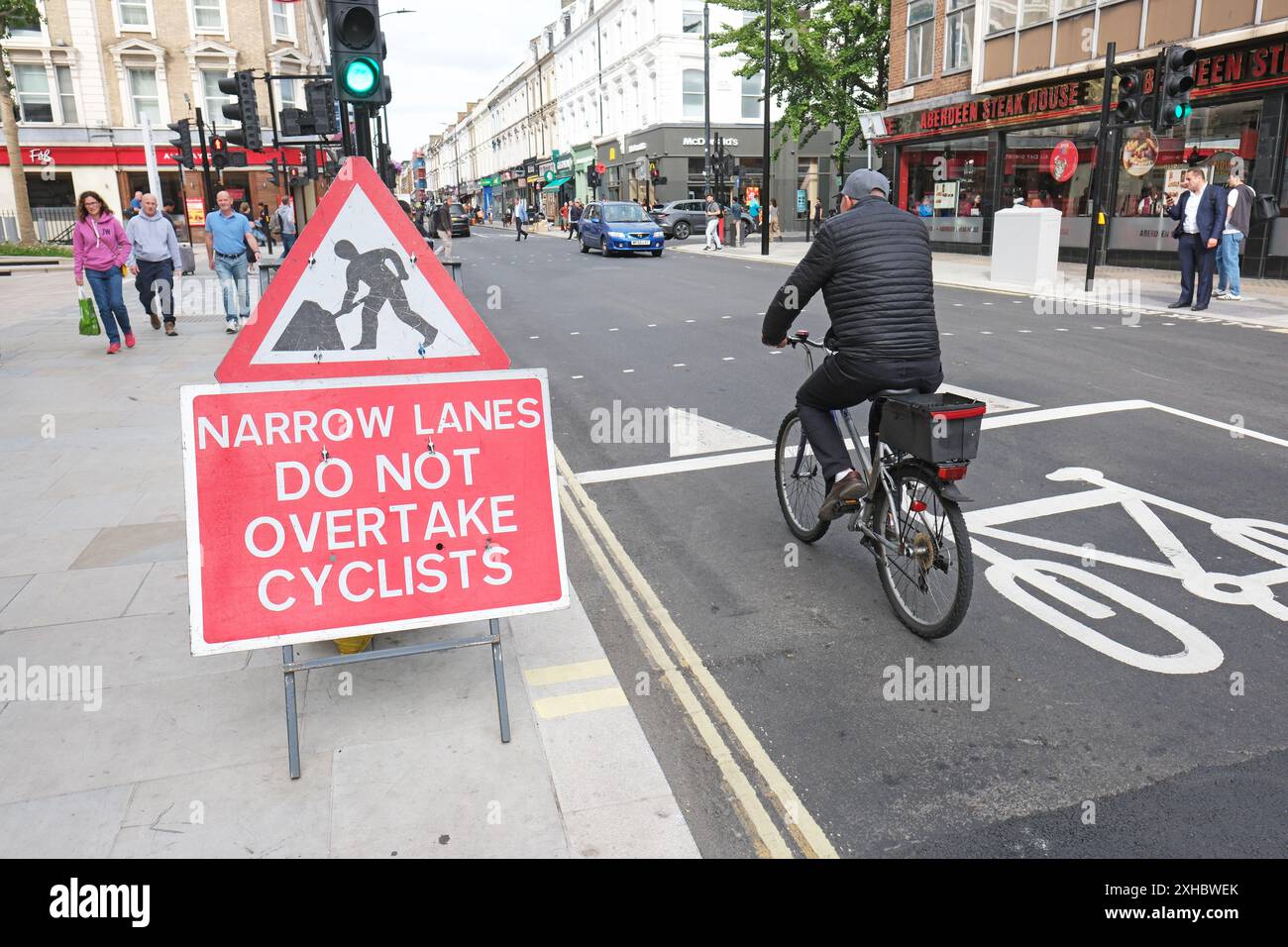 London road safety warning sign Narrow Lanes Do Not Overtake Cyclists ...