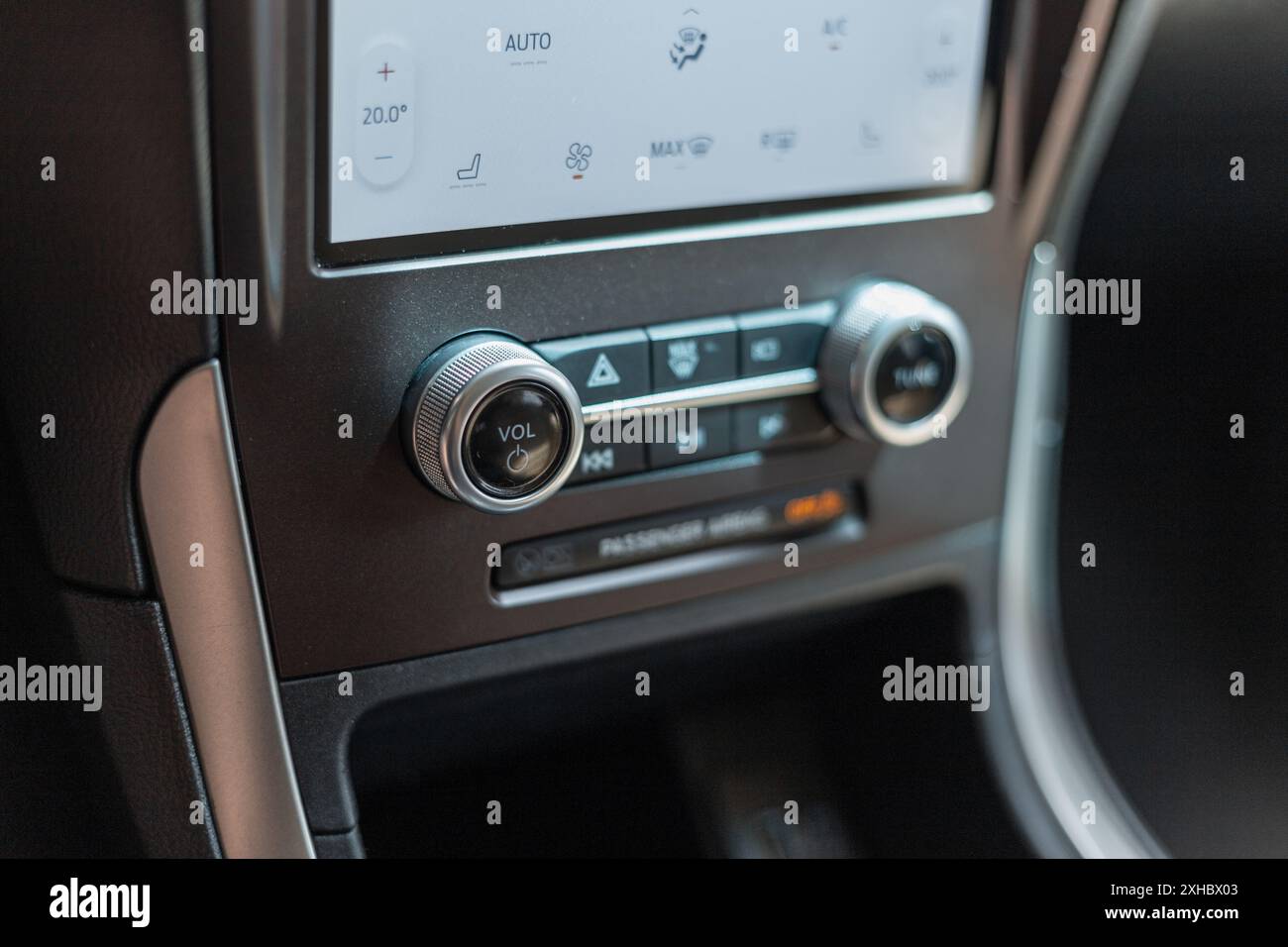 Car interior with control panel, display, sound and tune controls ...