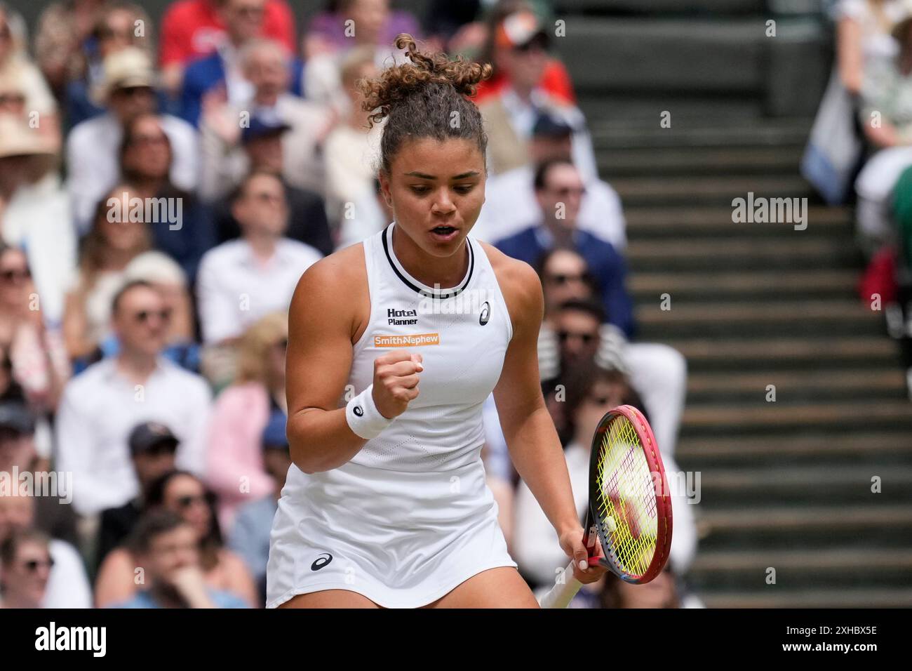 Jasmine Paolini of Italy celebrates winning a point against Barbora ...