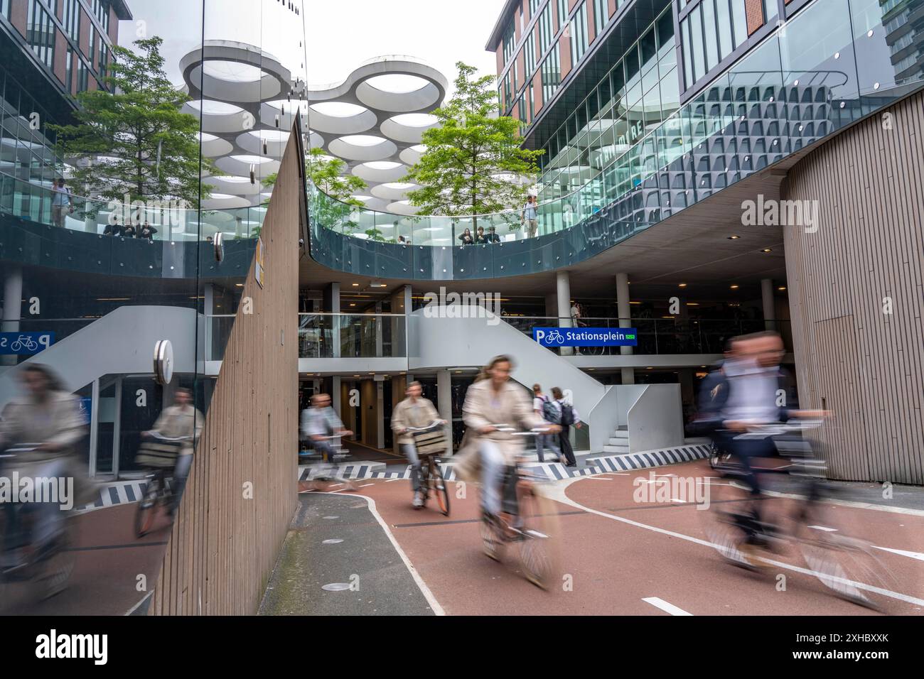Entrance and exit of the bicycle parking garage at Utrecht Centraal station, Stationsplein, over ...