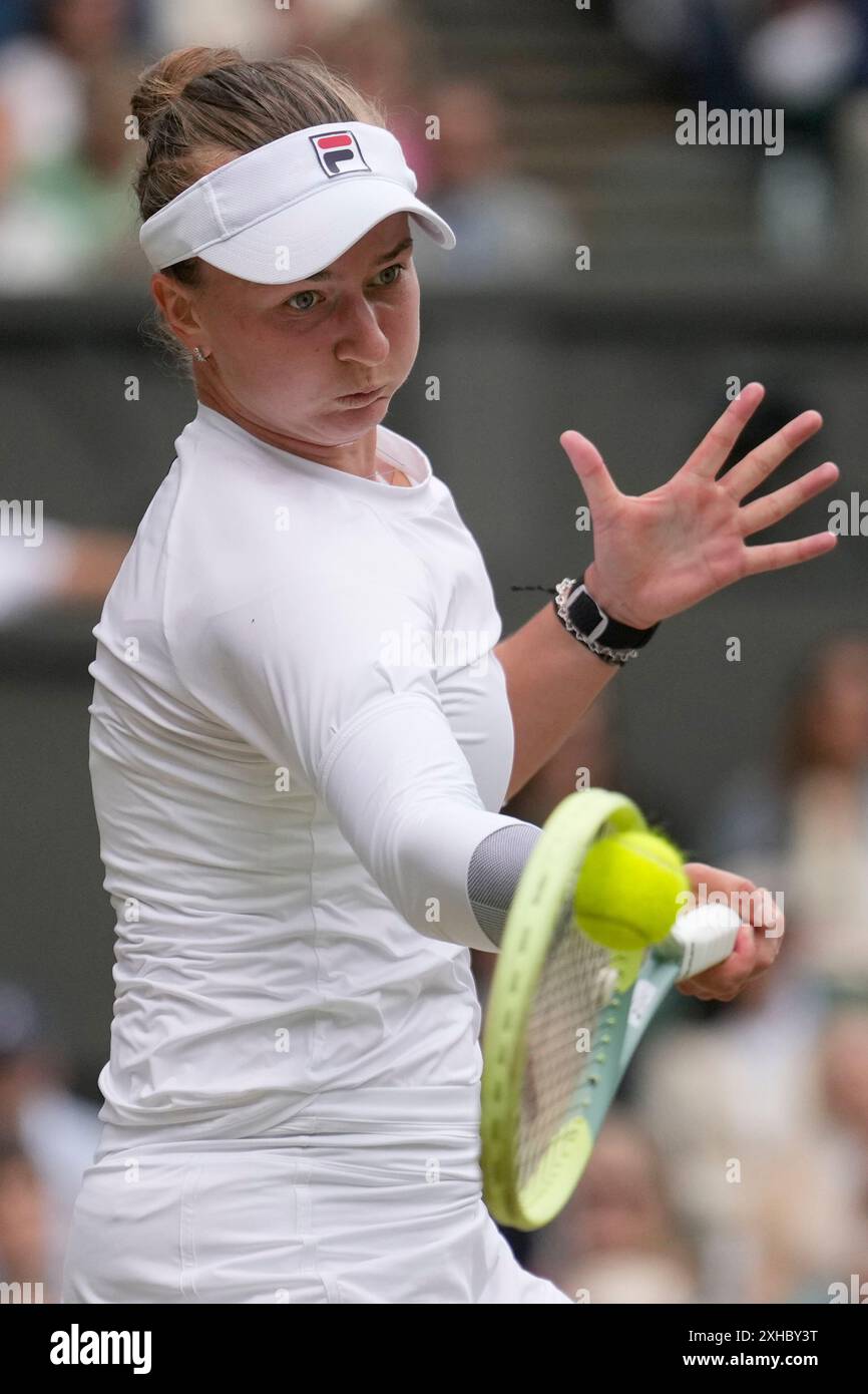 Barbora Krejcikova of the Czech Republic plays a forehand return to ...