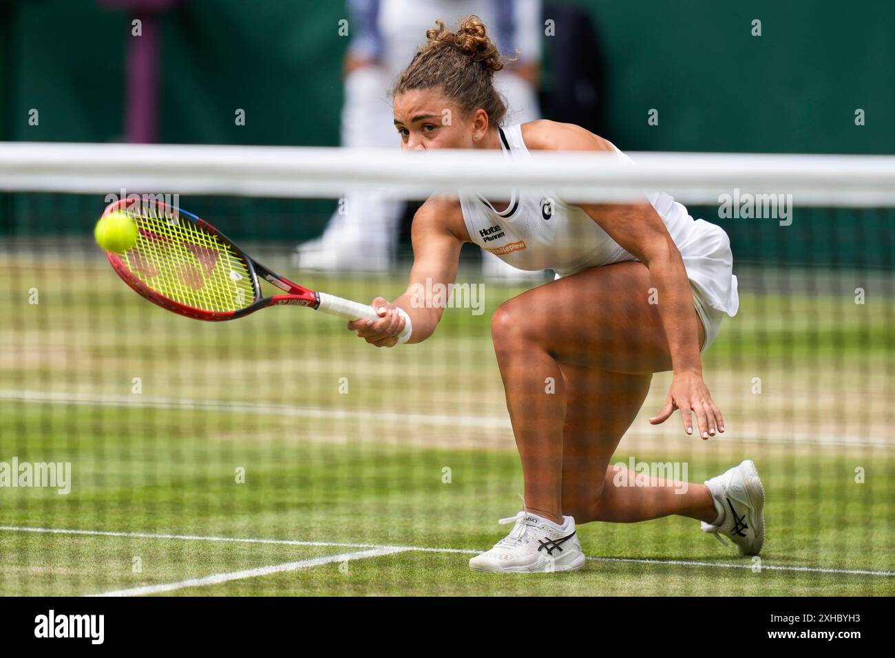 Jasmine Paolini of Italy plays a forehand return to Barbora Krejcikova ...