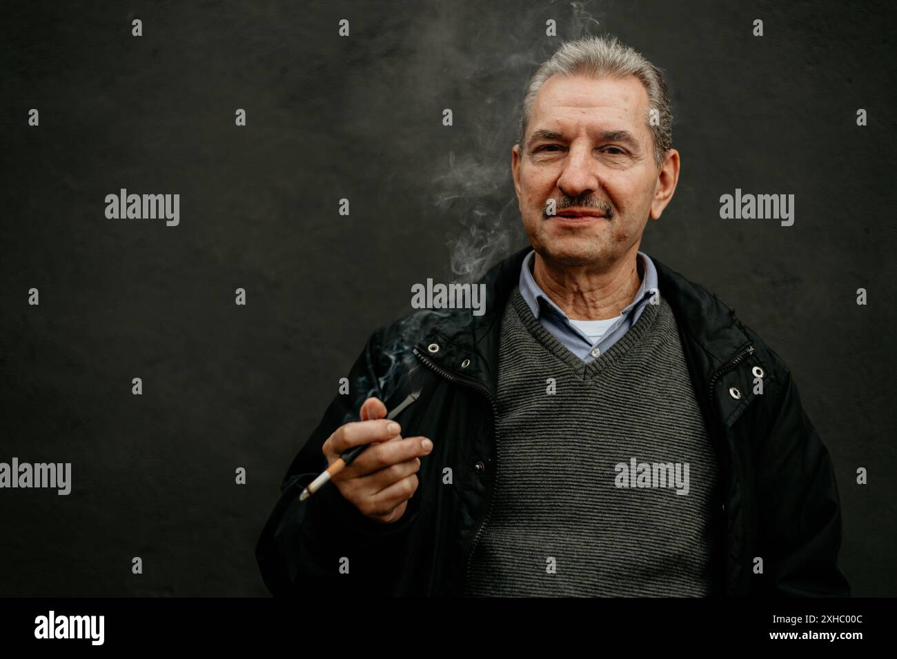 Studio portrait of a man with a mustache and beard hi-res stock ...