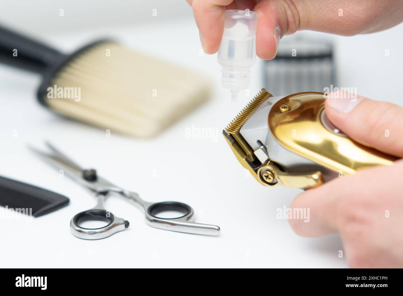 Putting oil on hair hi-res stock photography and images - Alamy