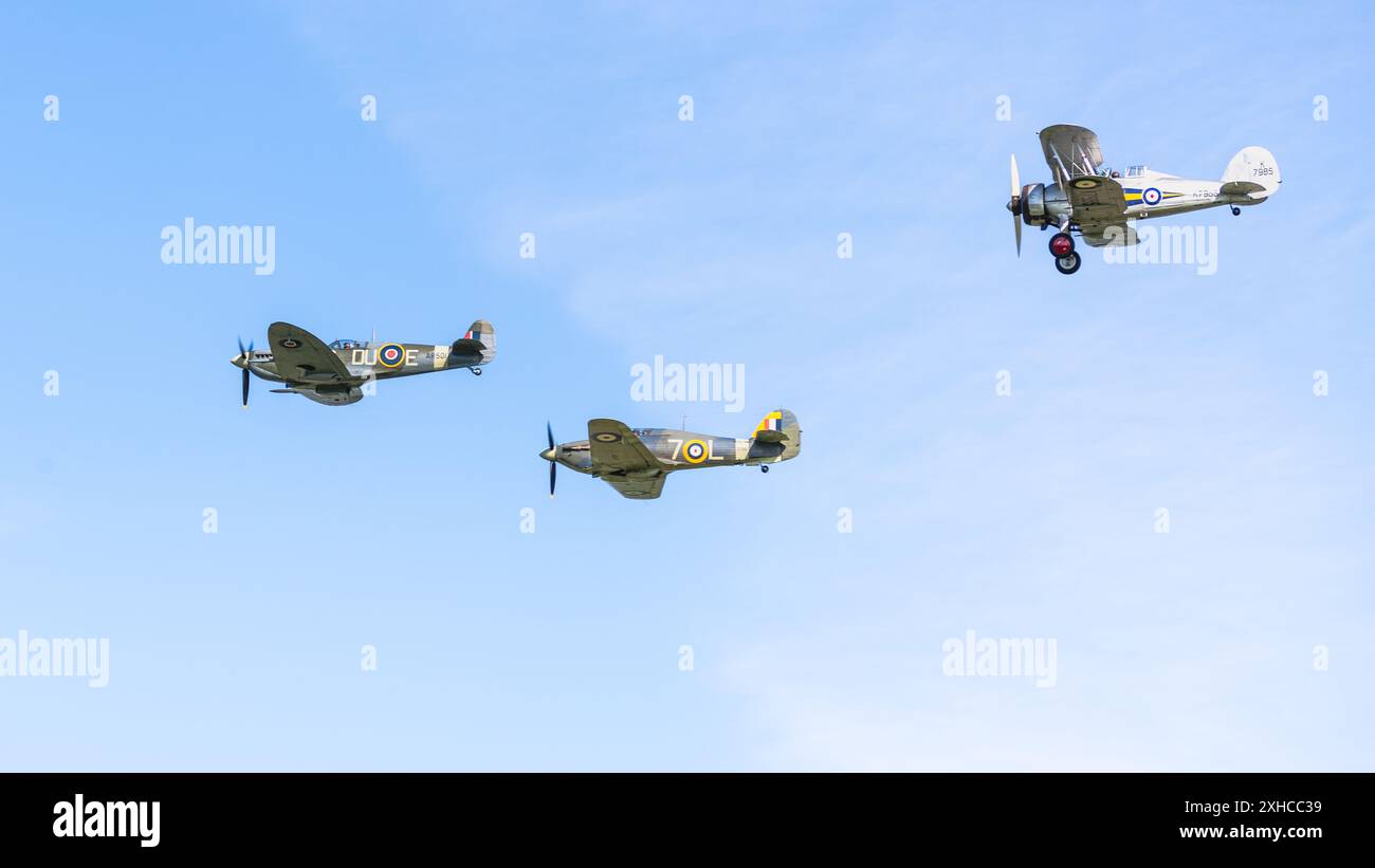 1938 Gloster Gladiator, 1941 Hawker Sea Hurricane 1b & Supermarine Spitfire Mk VC, airborne at ...