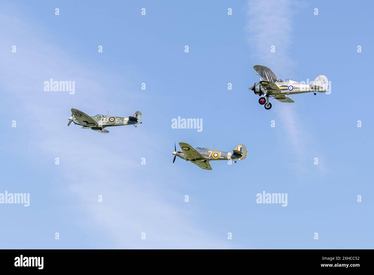 1938 Gloster Gladiator, 1941 Hawker Sea Hurricane 1b & Supermarine Spitfire Mk VC, airborne at ...