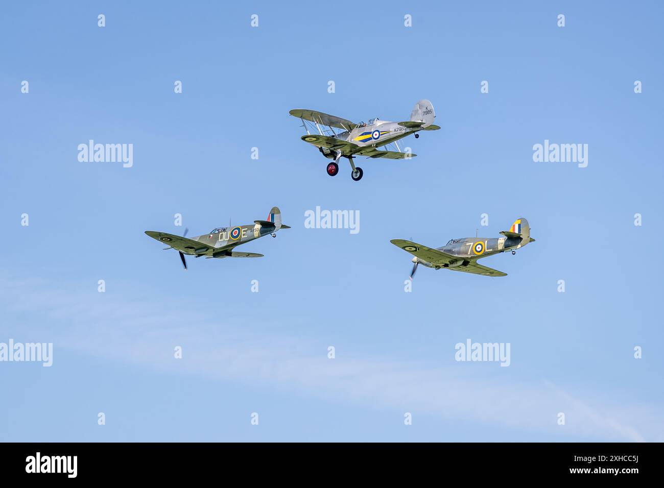 1938 Gloster Gladiator, 1941 Hawker Sea Hurricane 1b & Supermarine Spitfire Mk VC, airborne at ...