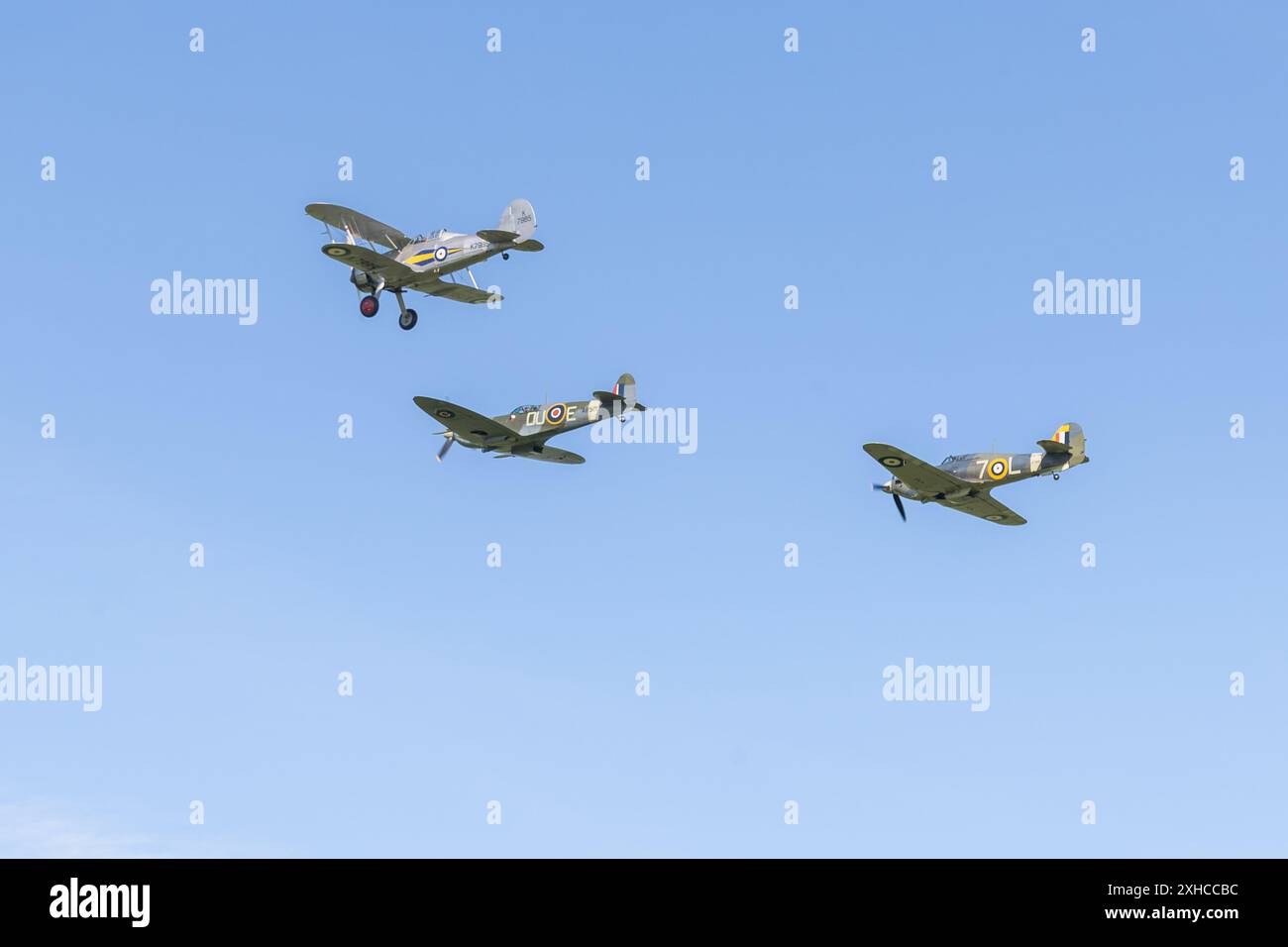 1938 Gloster Gladiator, 1941 Hawker Sea Hurricane 1b & Supermarine Spitfire Mk VC, airborne at ...