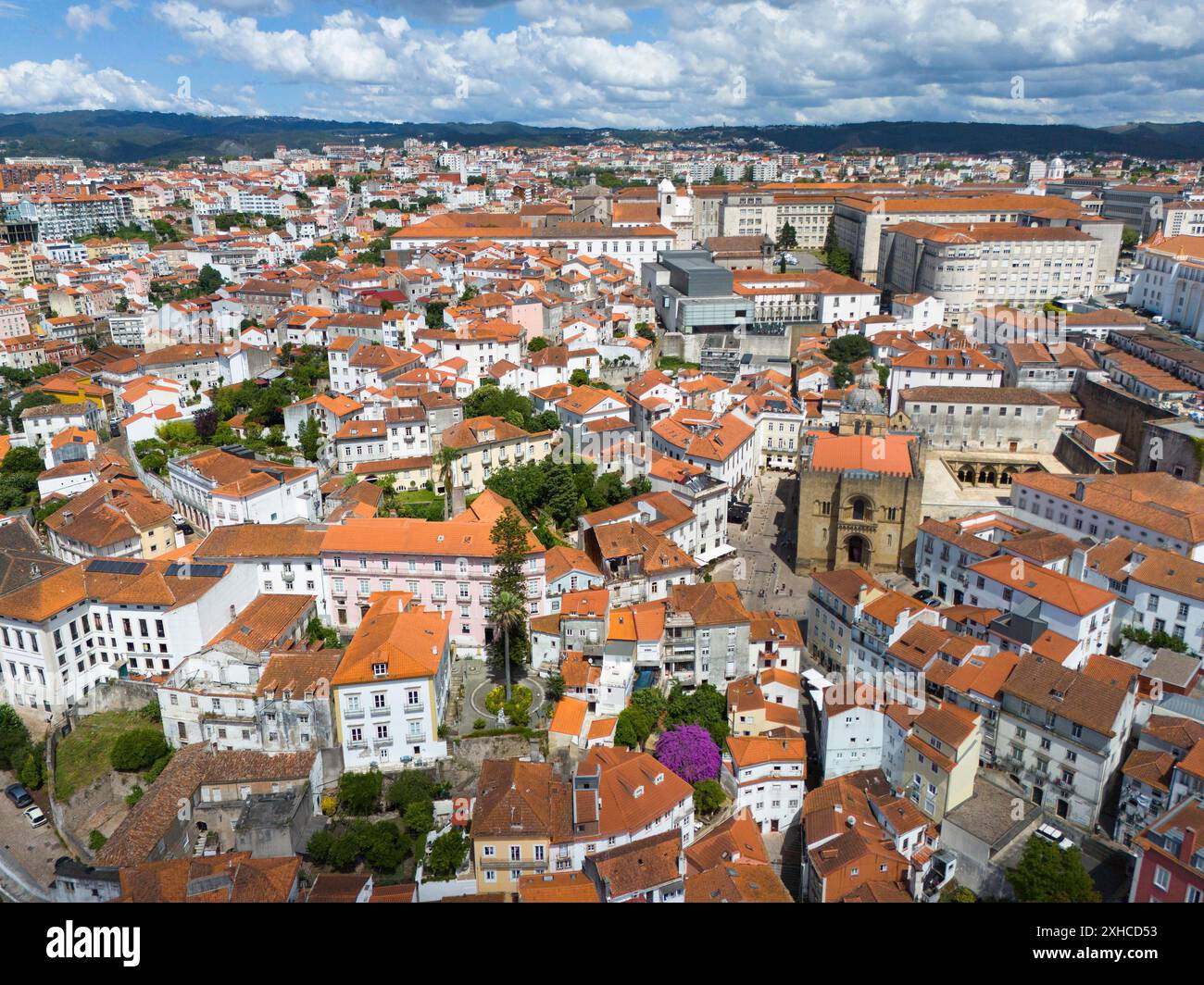Dense urban environment with old red tiled roofs and historic ...