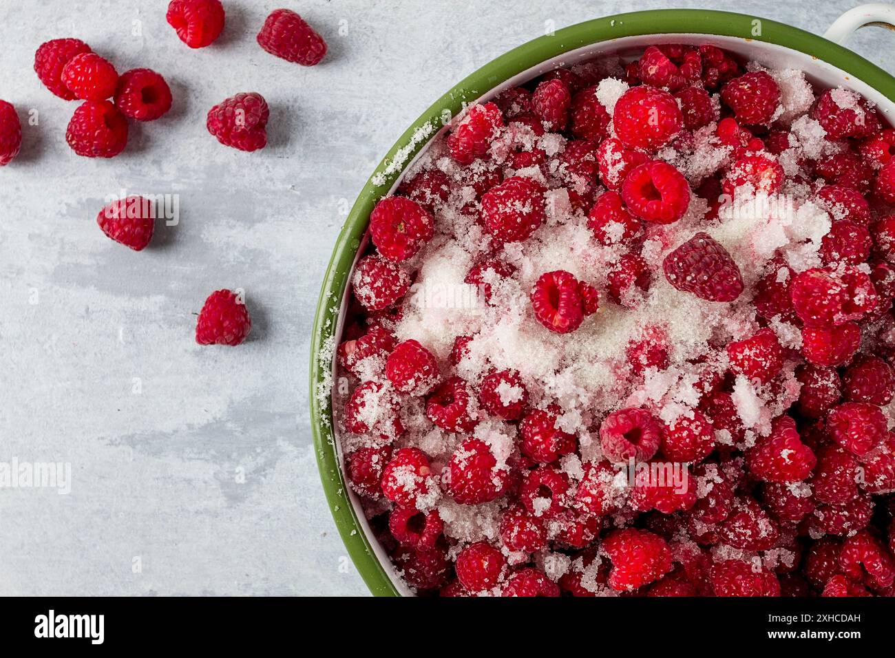 Fresh raspberry berry, covered with granulated sugar, jam preparation ...