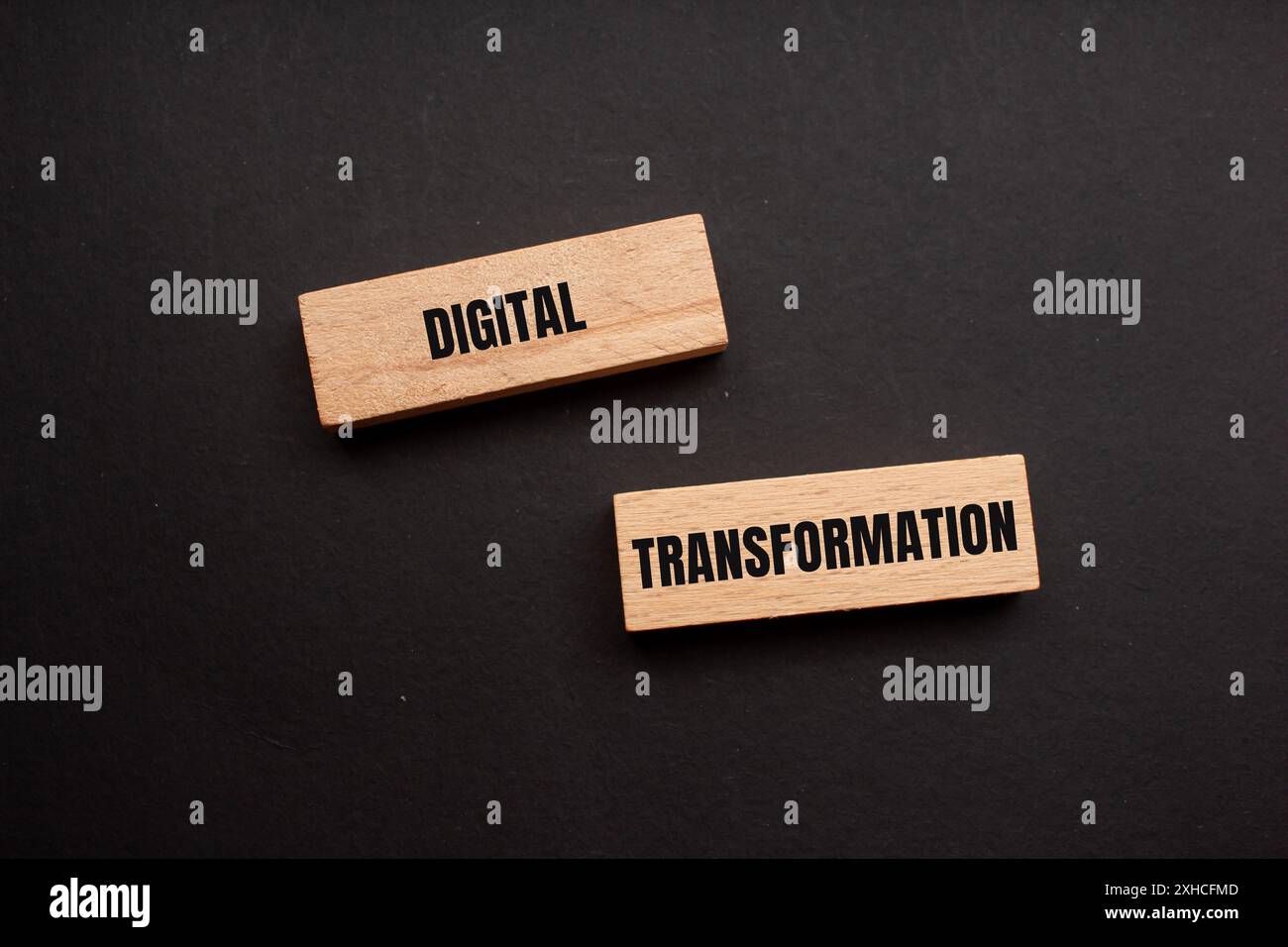 Digital transformation message written on wooden blocks with black ...