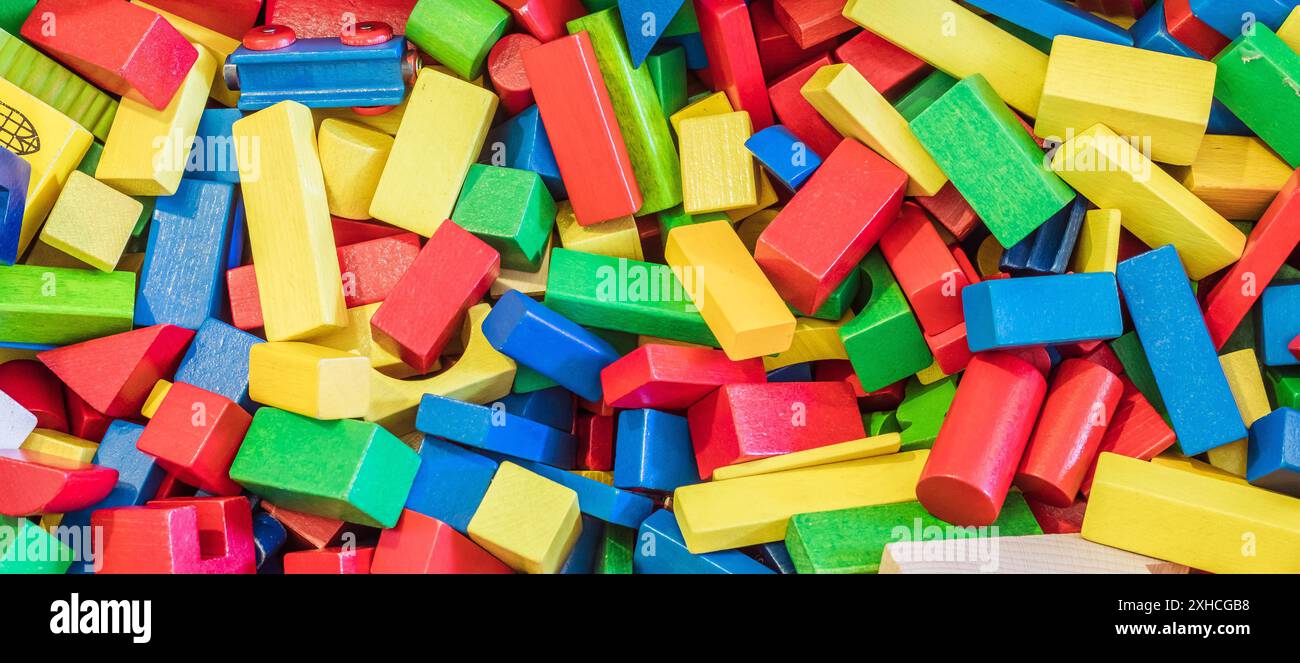Colorful wooden toy blocks in a box Stock Photo - Alamy