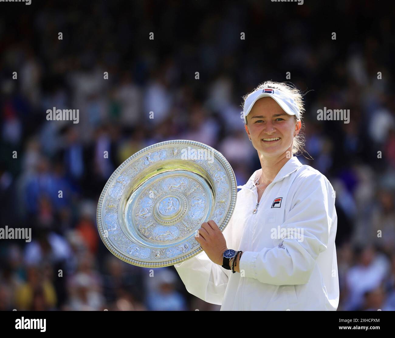 Barbora Krejcikova of Czech Republic holds a trophy after winning the ladies' singles final ...