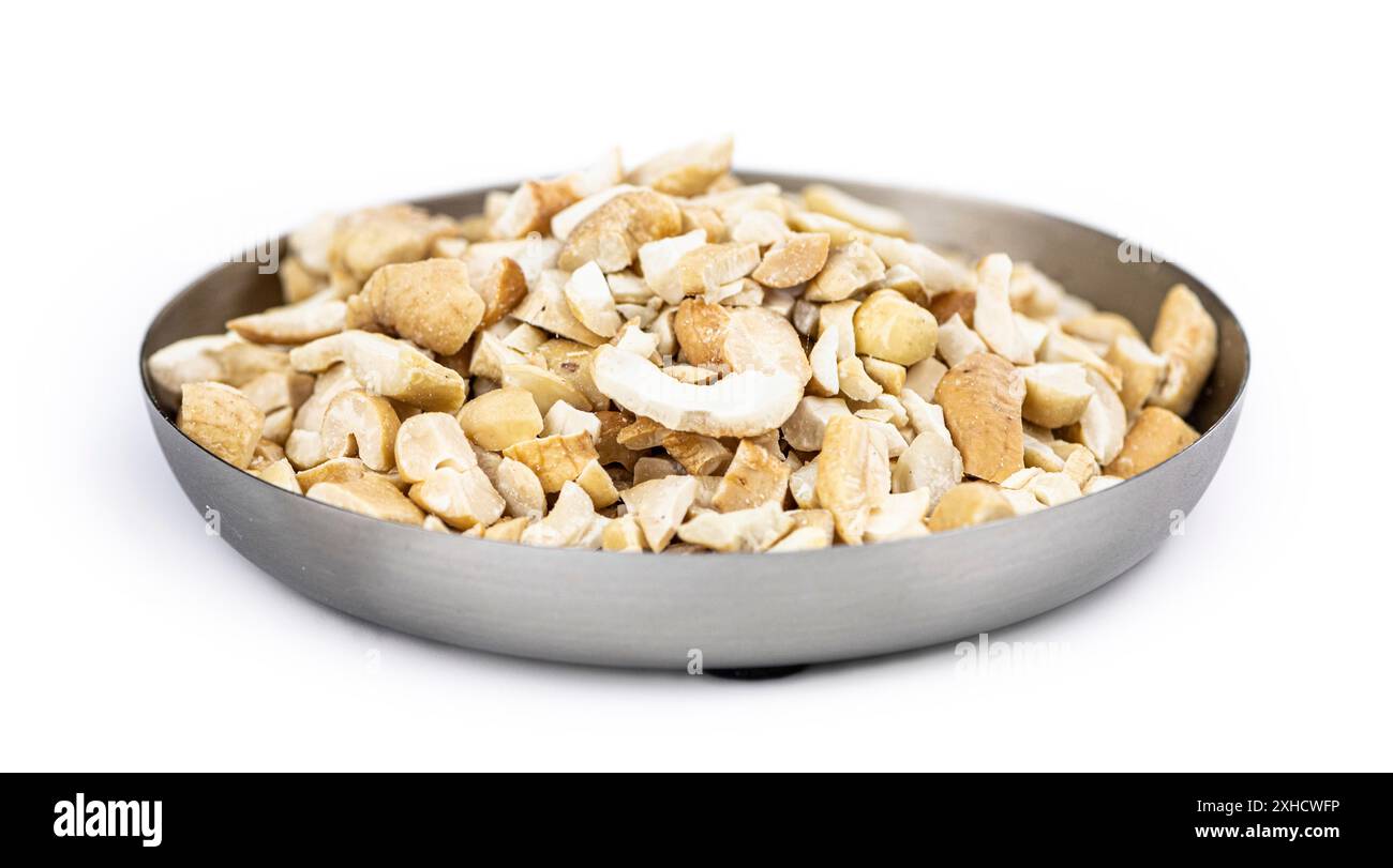 Portion of chopped Cashew nuts isolated on pure white background ...