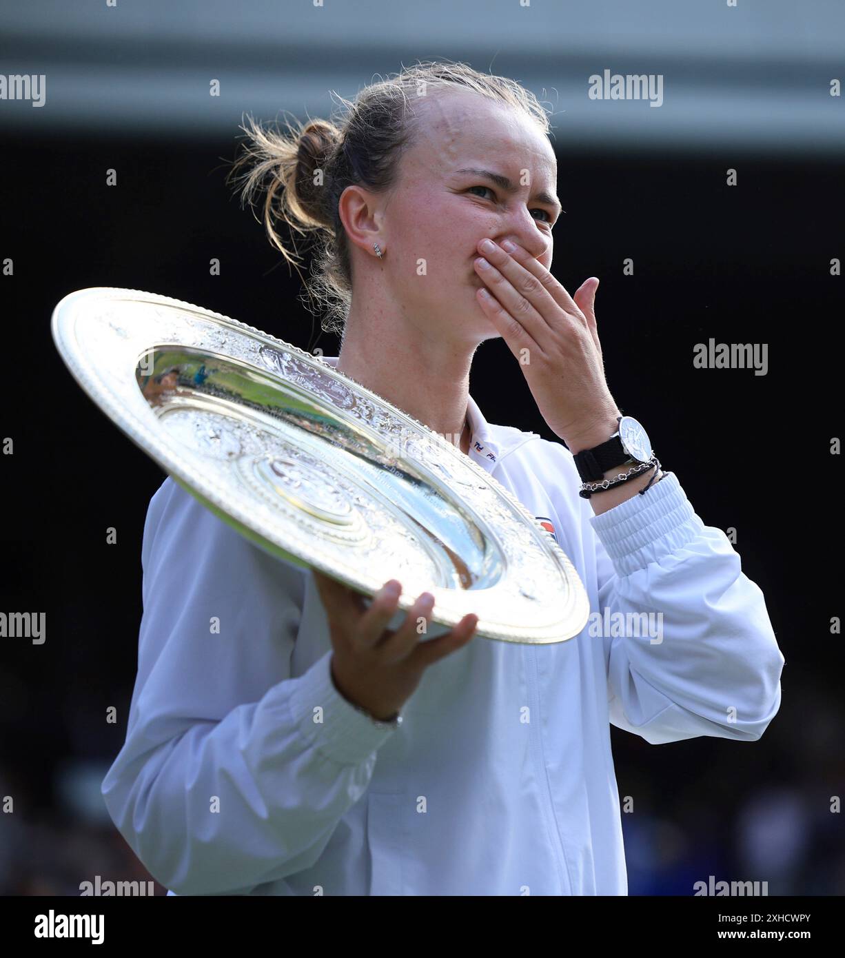Barbora Krejcikova of Czech Republic holds a trophy after winning the ladies' singles final ...