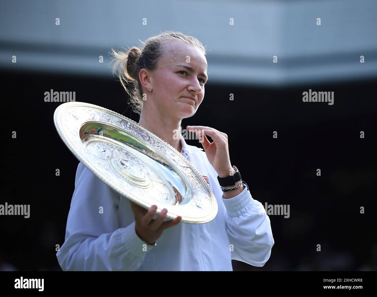 Barbora Krejcikova of Czech Republic holds a trophy after winning the ladies' singles final ...