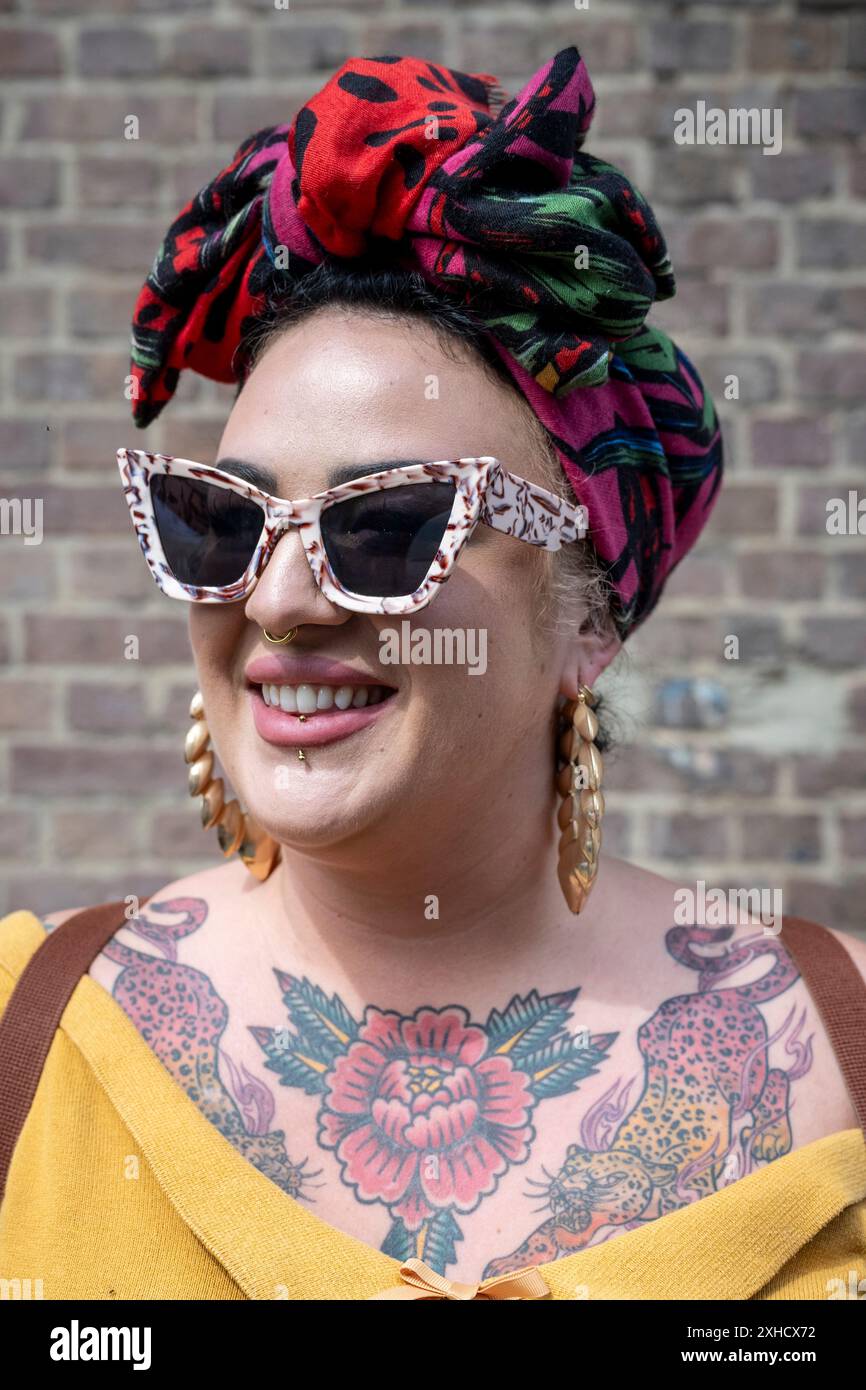 Chesham, UK. 13 July 2024. A visitor wearing a hat attends Hats Off ...