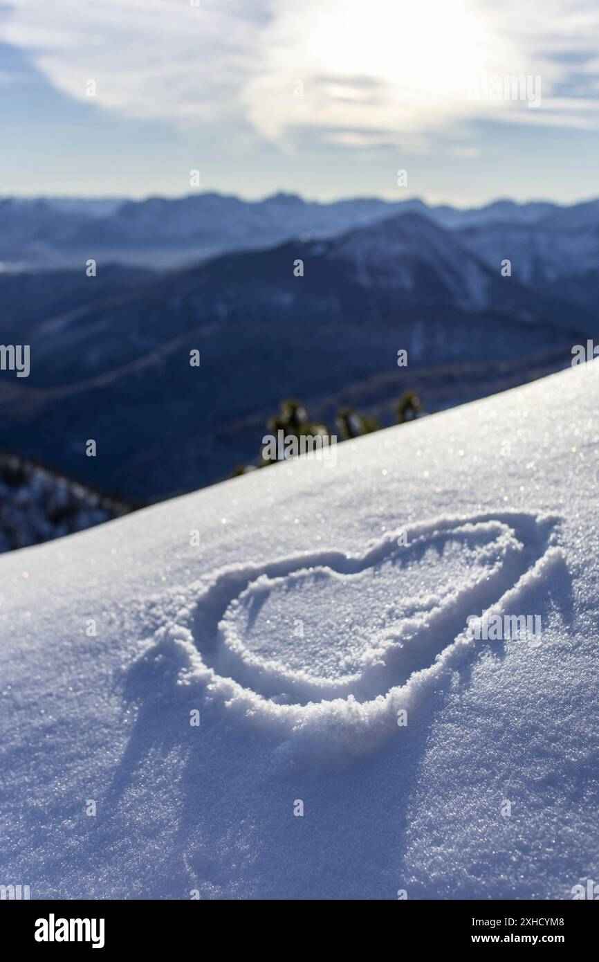 Heart drawn in fresh snow Stock Photo - Alamy
