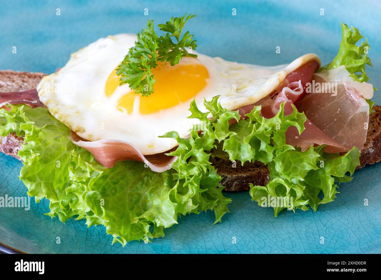 Egg sunny side up on bread Stock Photo - Alamy