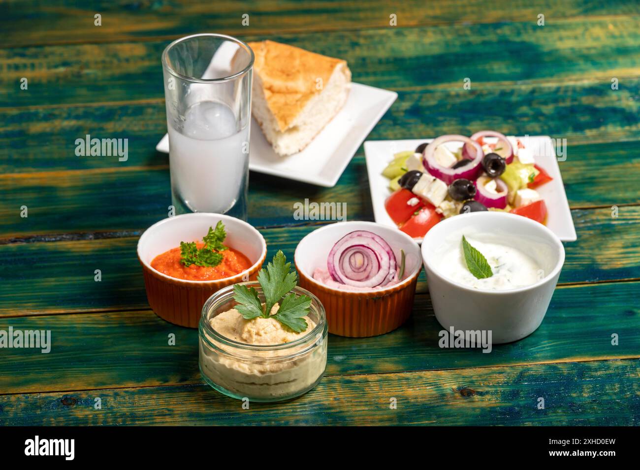 Greek starter on green wood Stock Photo - Alamy