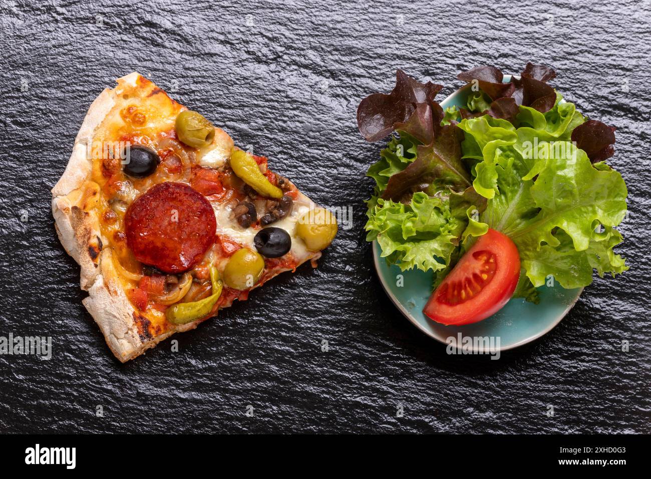 Overview of a slice of pizza on wood hi-res stock photography and ...