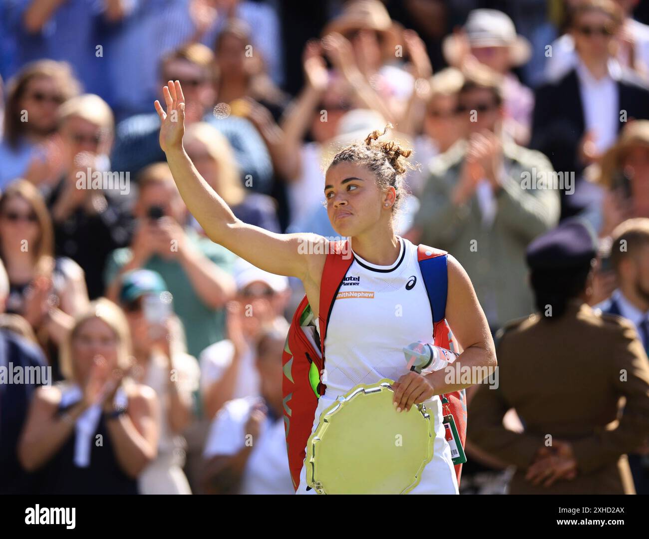 Jasmine Paolini of Italy leaves the court after losing the ladies ...