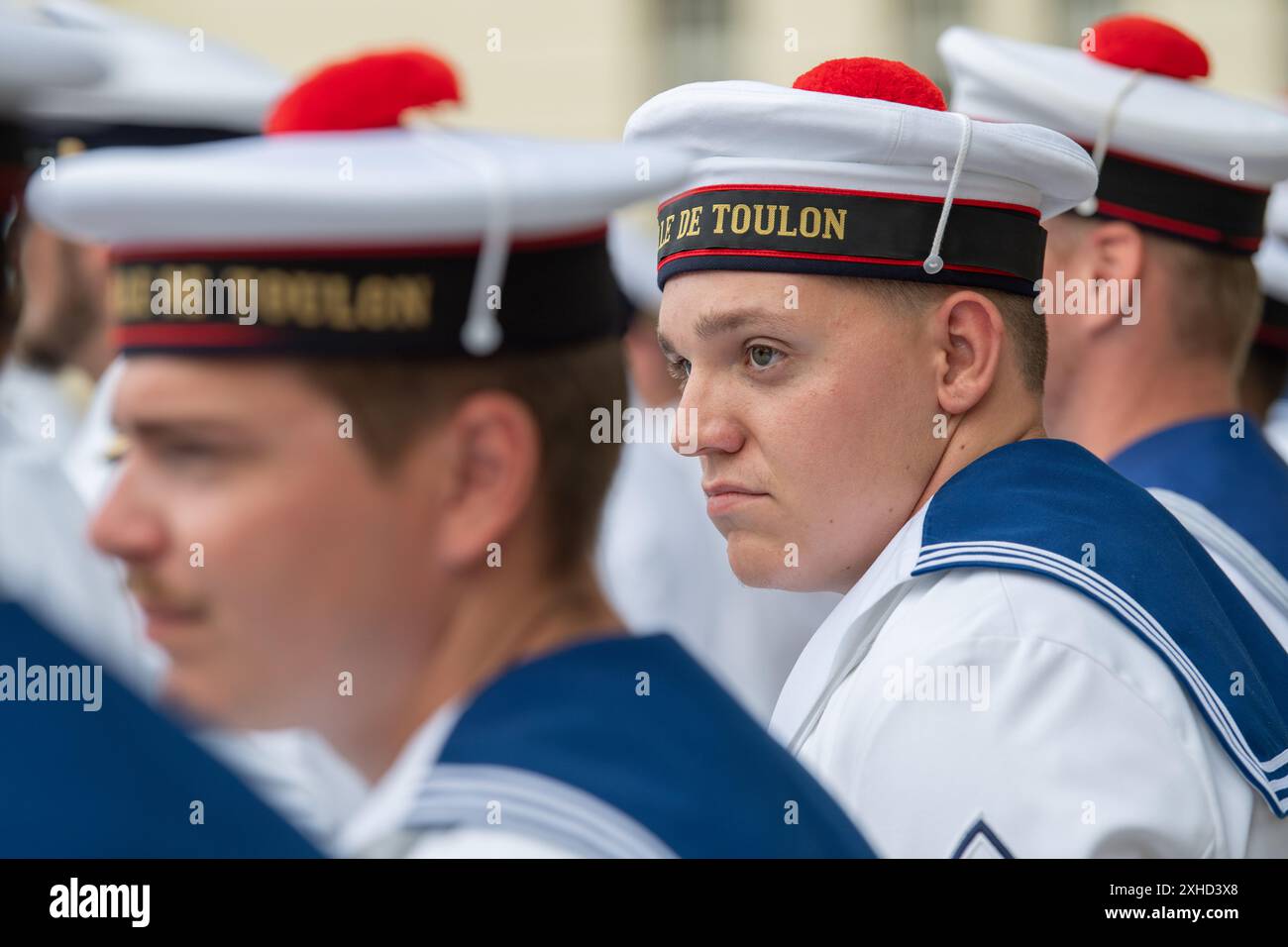 Sailors attend the official ceremony for Captain Pierre Suleau to take ...
