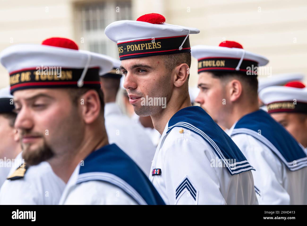 Sailors attend the official ceremony for Captain Pierre Suleau to take ...