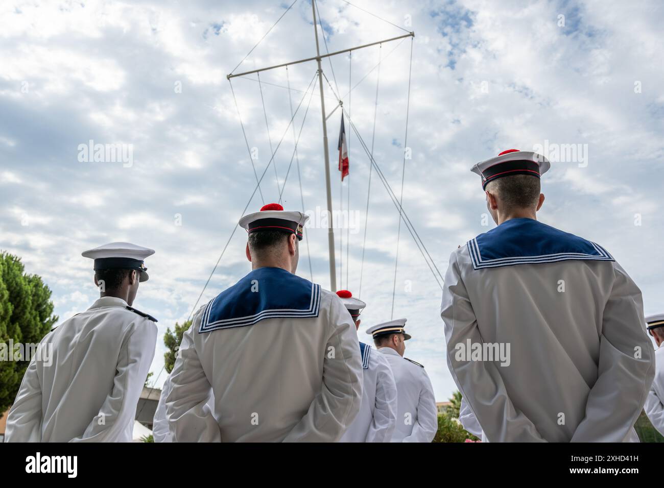 Sailors attend the official ceremony for Captain Pierre Suleau to take ...