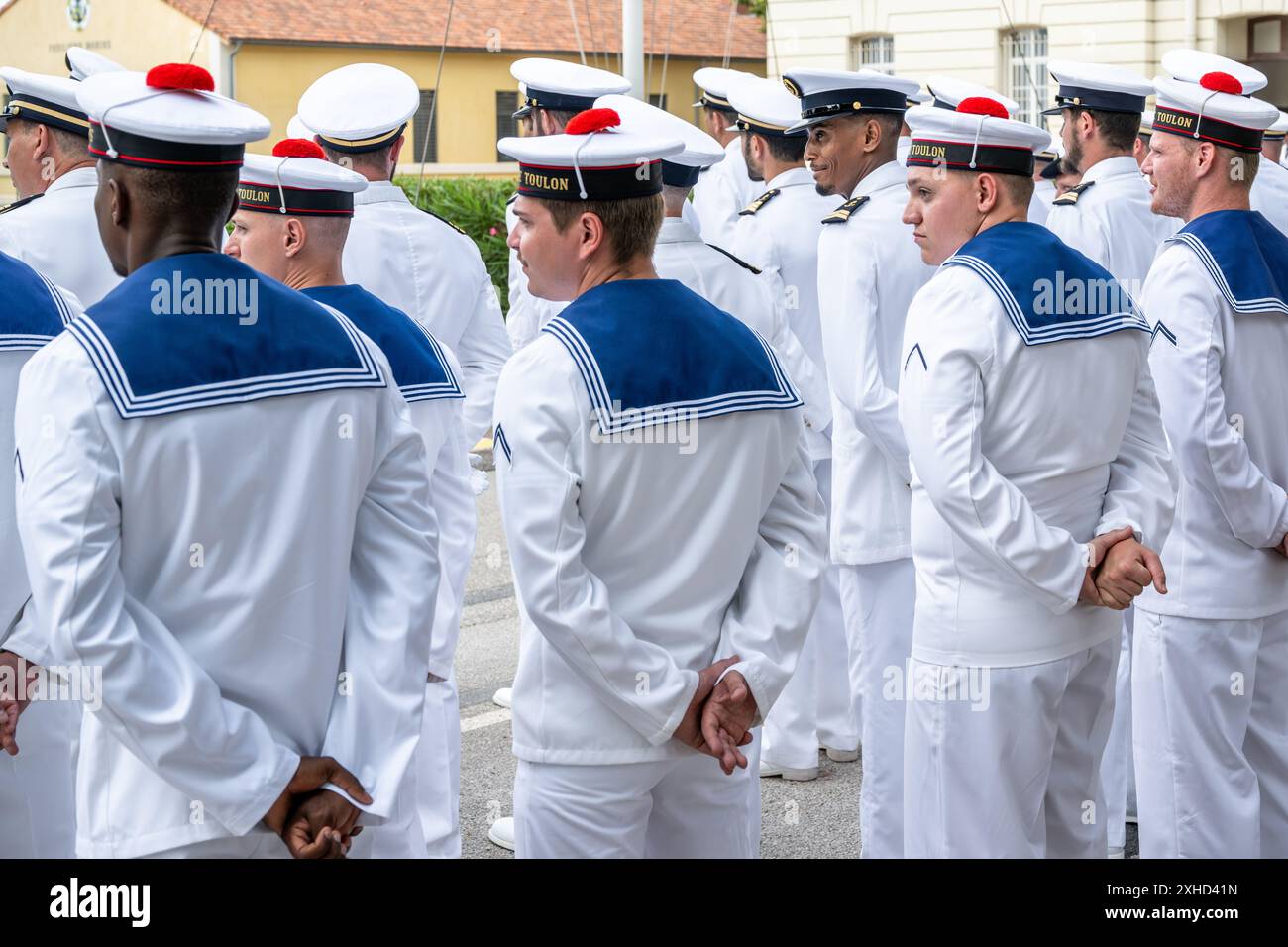 Sailors attend the official ceremony for Captain Pierre Suleau to take ...