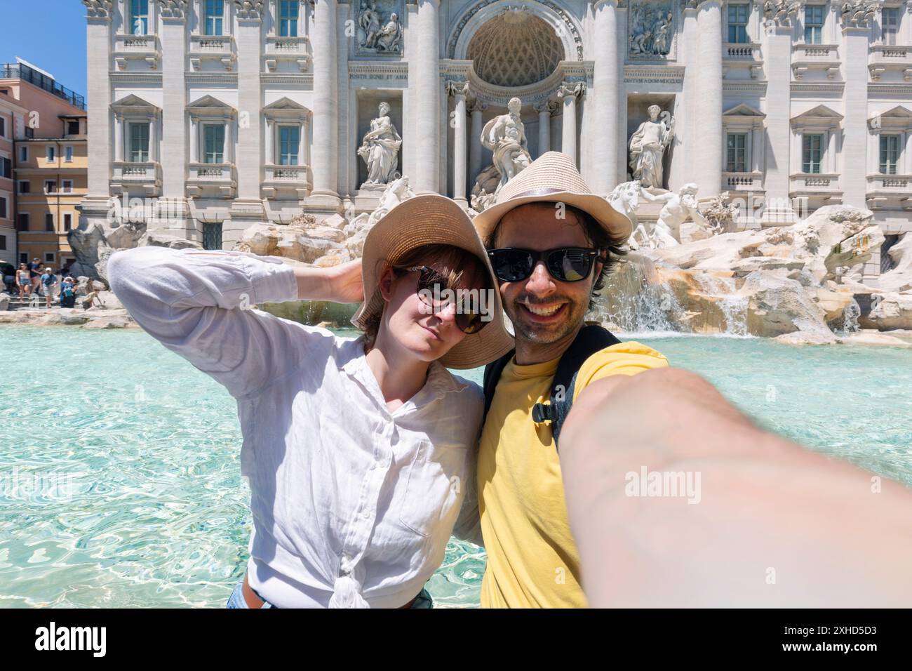 Tourist couple on travel taking selfie photo by Trevi Fountain in Rome ...