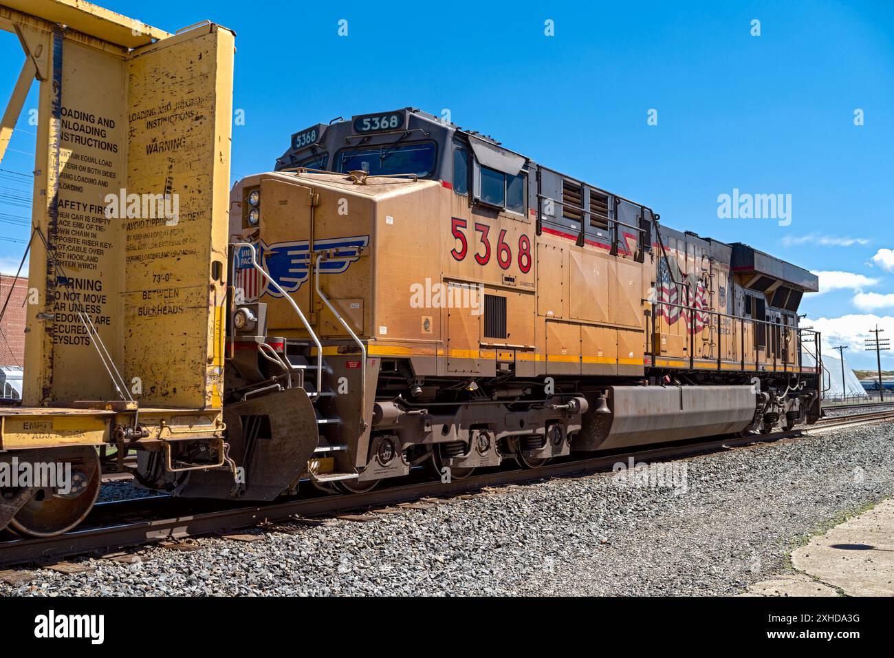 Union Pacific locomotive 5368 provides rear power to a train passing ...