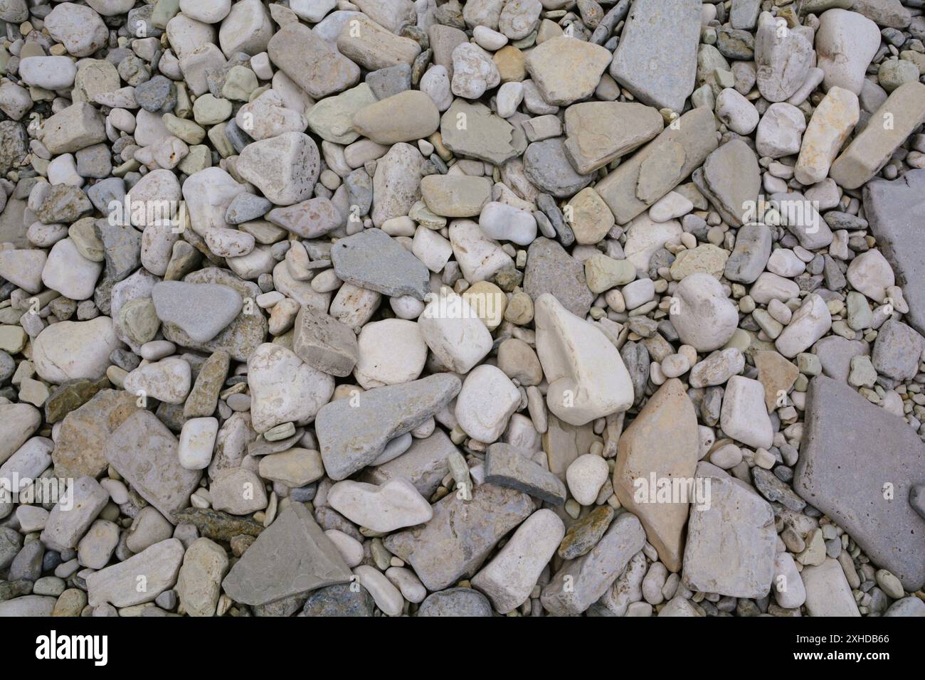 Closeup of rounded rocks and pebbles on the shores of Georgian Bay off ...