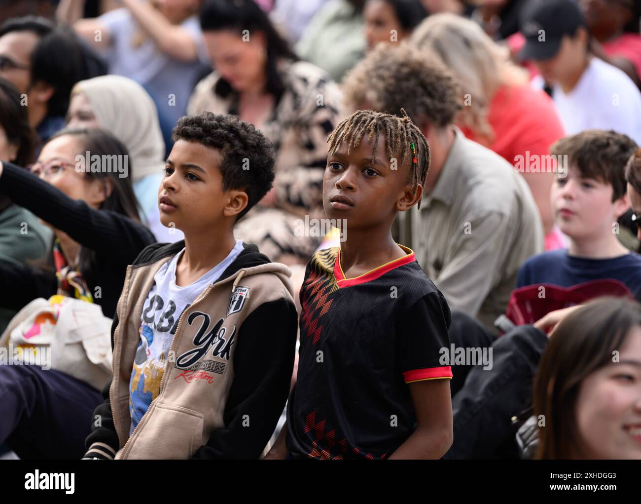 EDITORIAL USE ONLY Crowds watch as Duncan Ward conducts the London ...