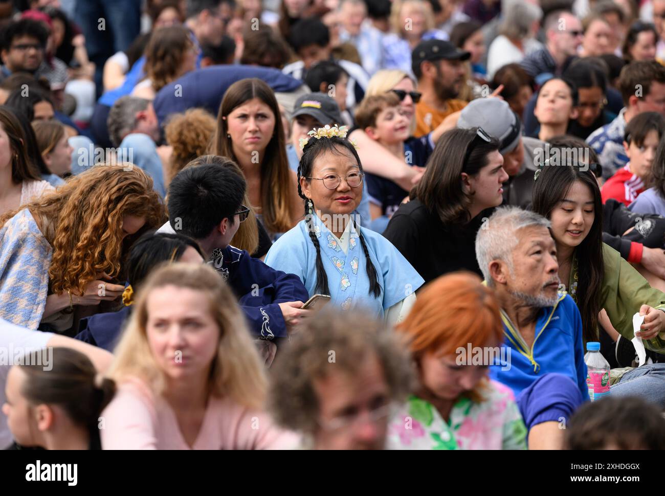 EDITORIAL USE ONLY Crowds watch as Duncan Ward conducts the London ...