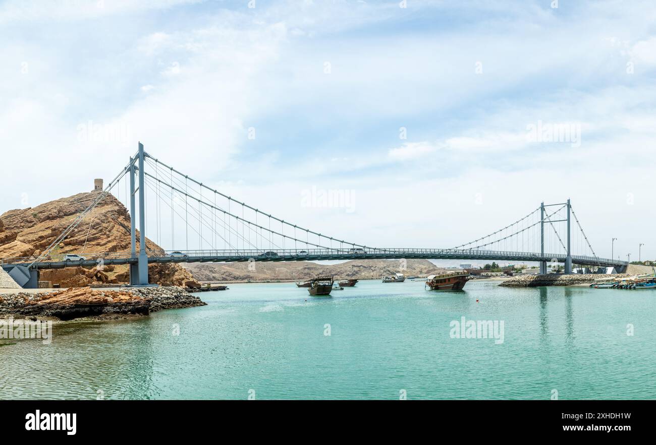 Traditional omani wooden dhow boats under Al Ayjah bridge, Sur ...