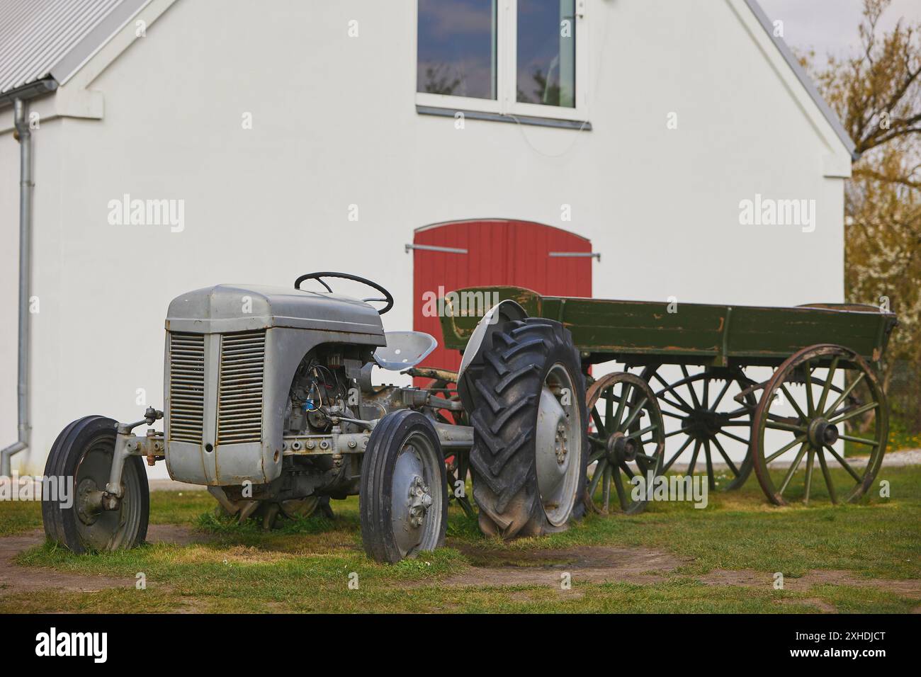 Vintage tractor and cart at the ranch in Denmark Stock Photo - Alamy