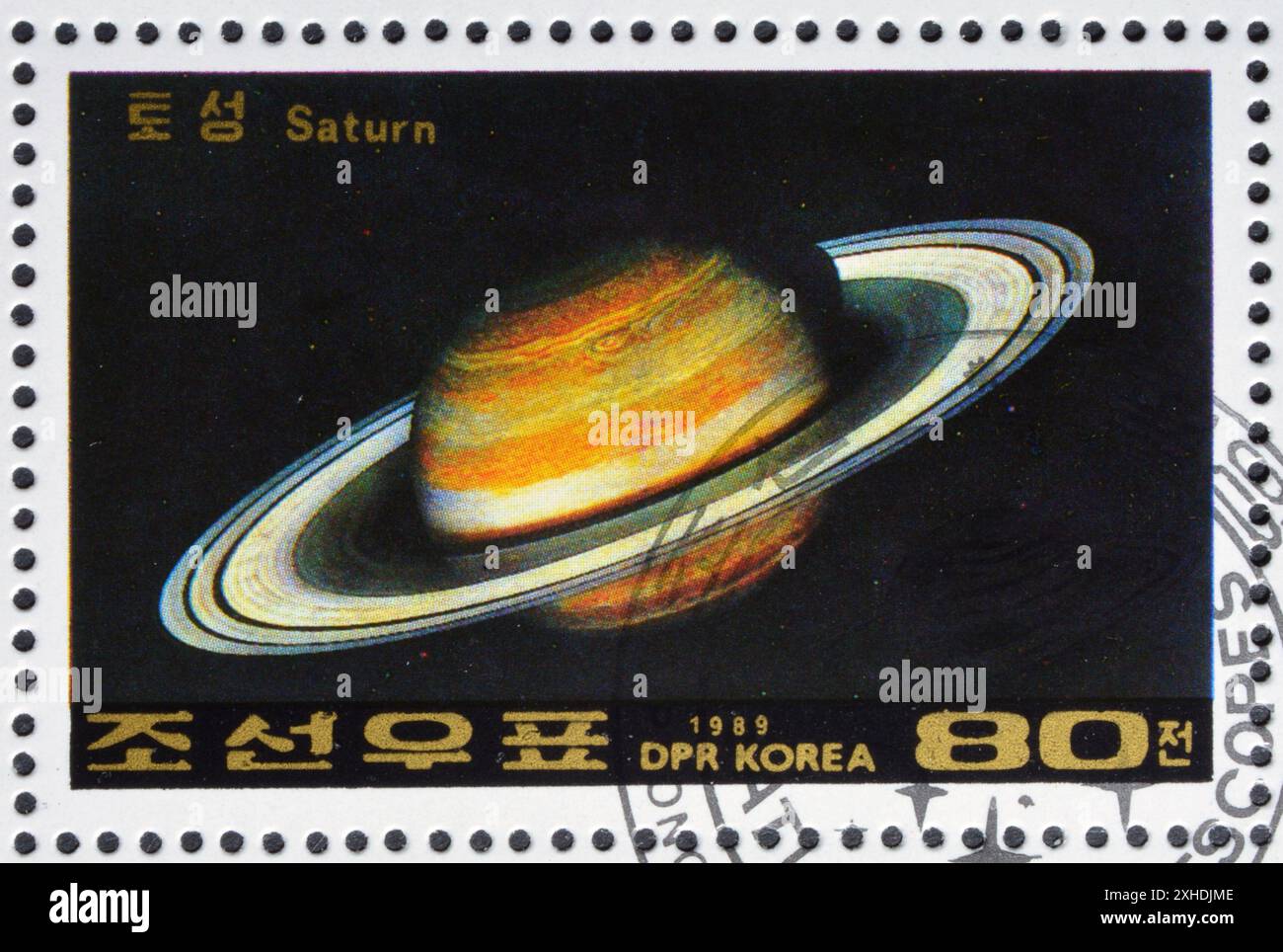 Cancelled postage stamp printed by North Korea, that shows Saturn ...