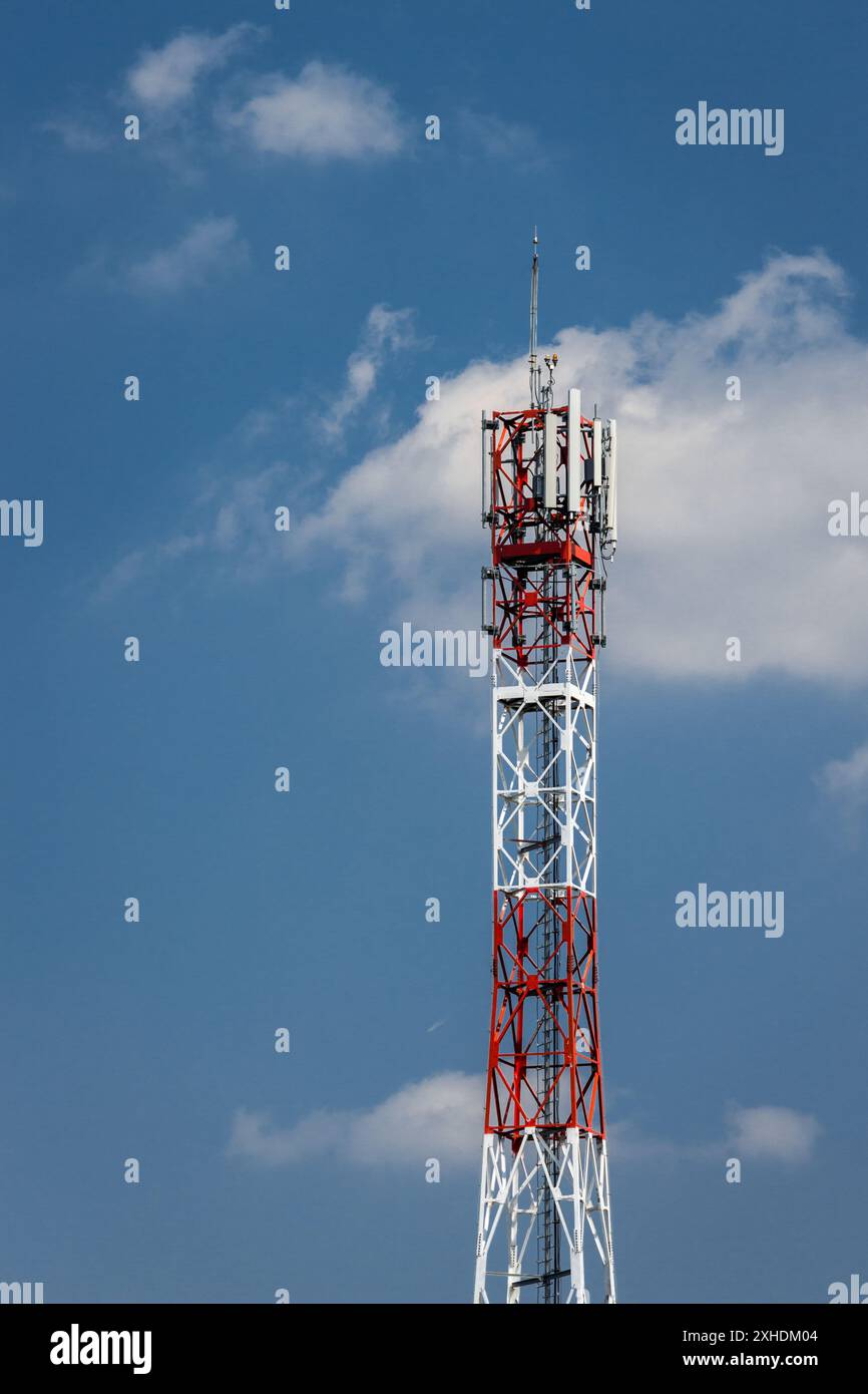 Tall cellular communication tower rises hi-res stock photography and ...