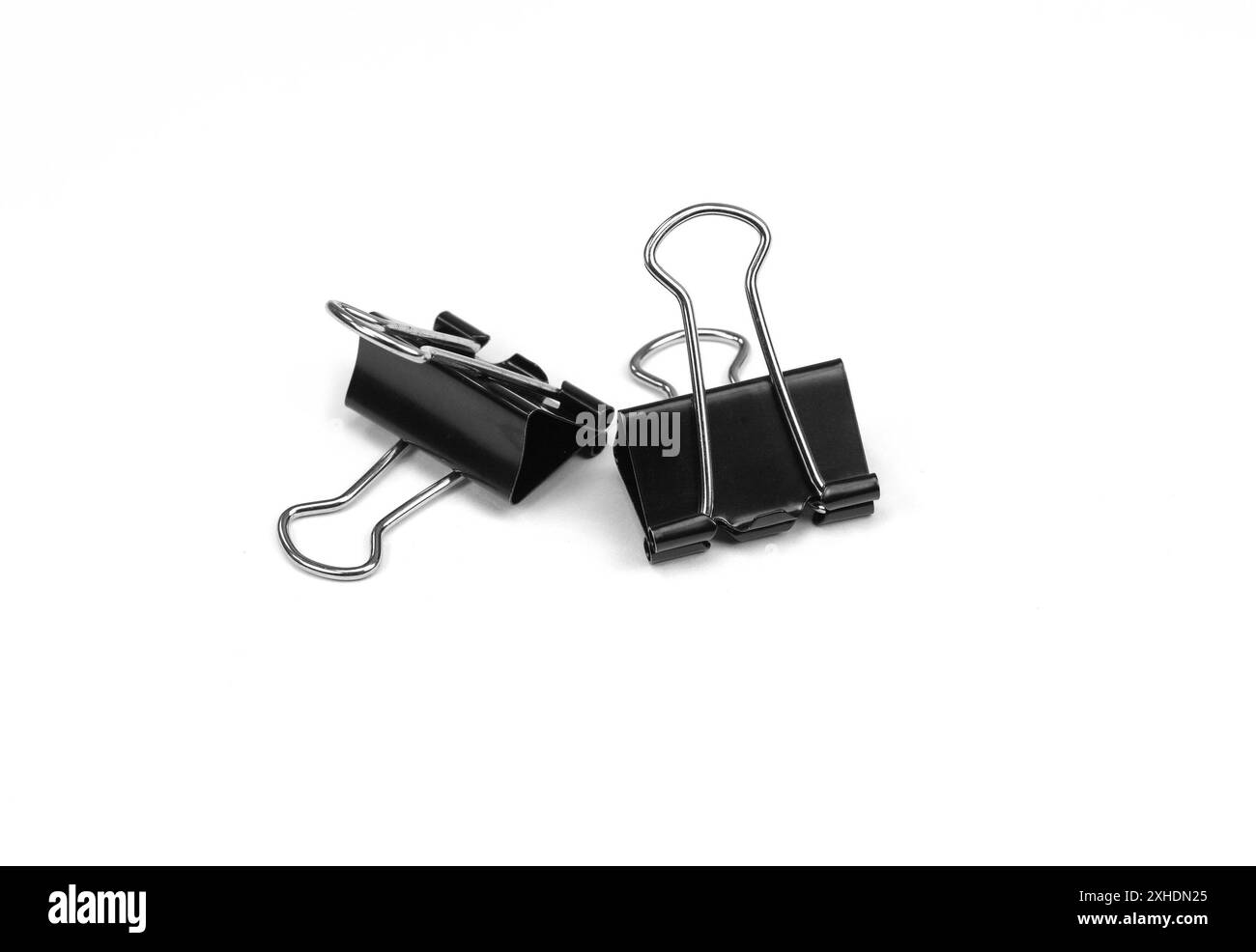 black paper clips isolated on white Stock Photo - Alamy