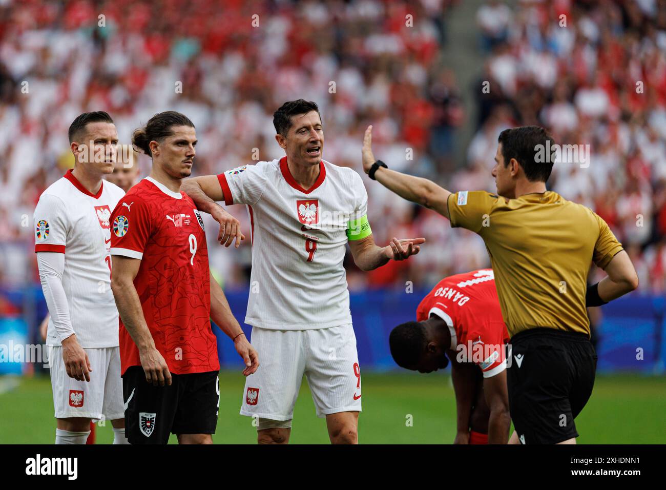 Marcel Sabitzer, Robert Lewandowski during UEFA Euro 2024 game between ...