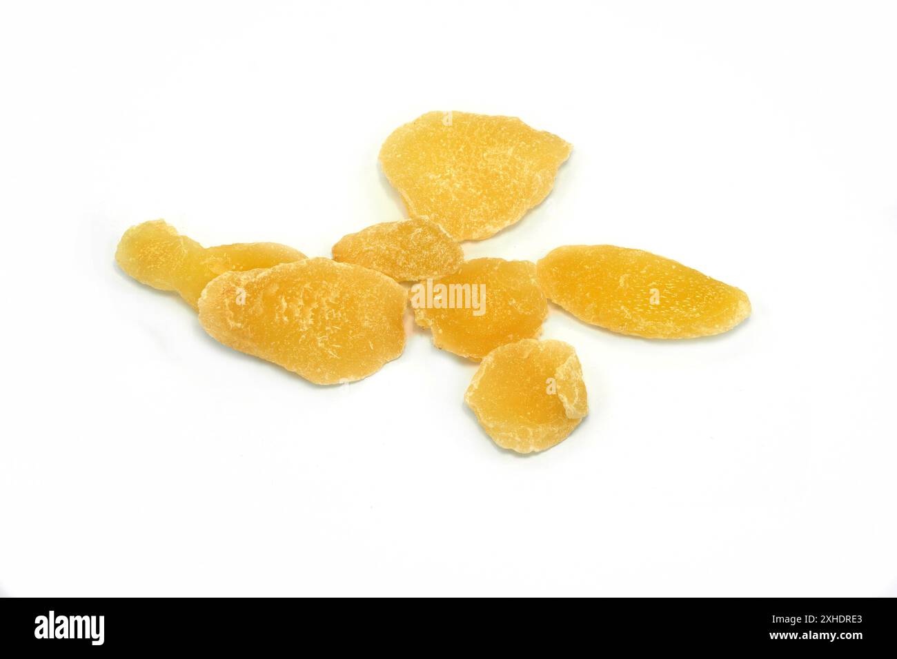 Dried ginger with sugar on a white background. Dried candied ginger ...